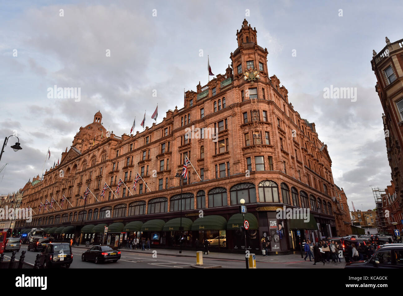 London, UK. 3rd Oct, 2017. People pass by Harrods department store in ...