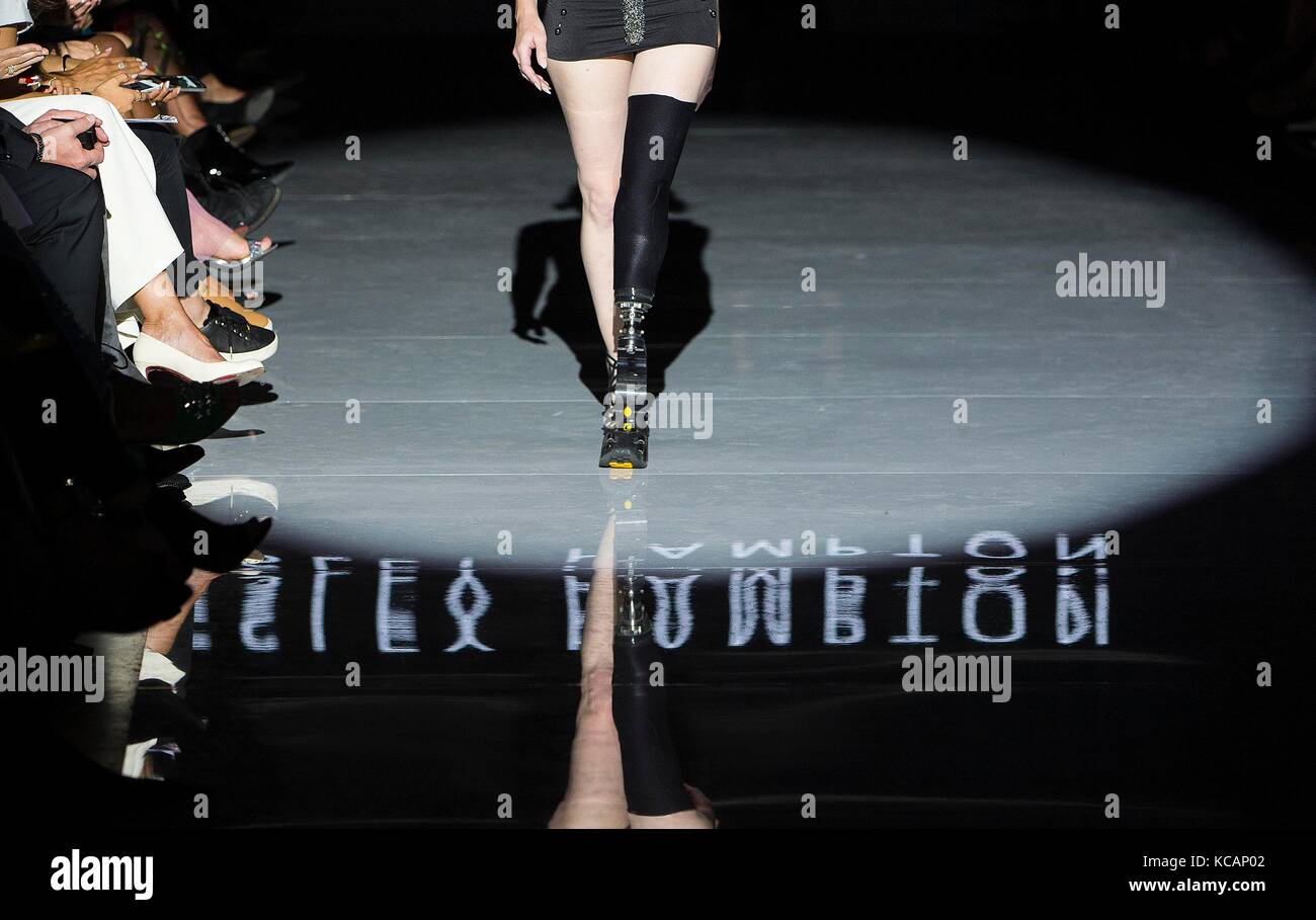 Toronto, Canada. 3rd Oct, 2017. A model with prosthetic leg presents a ...