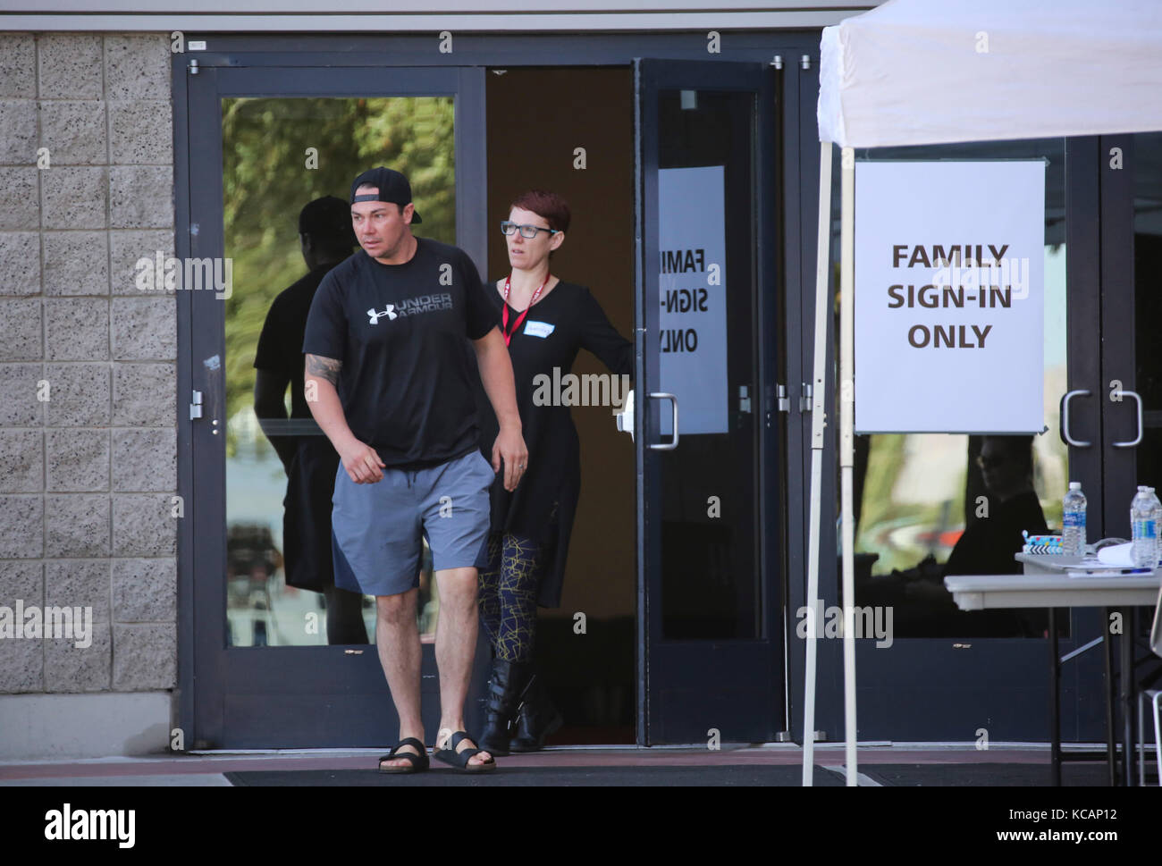 Las Vegas, USA. 3rd Oct, 2017. People walk out of a reunification ...
