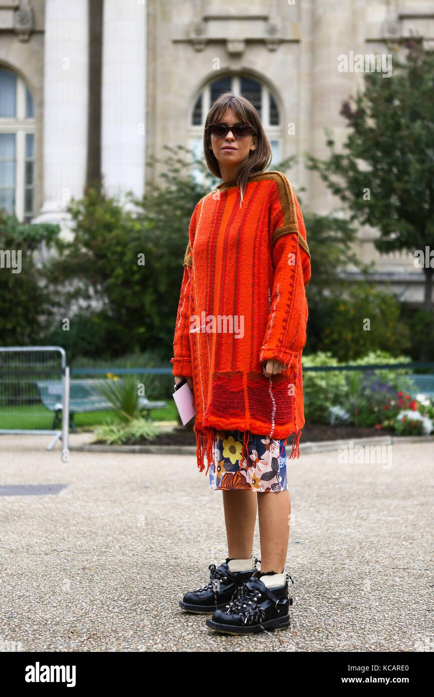 Carola Bernard posing outside of the Sacai runway show during Paris ...