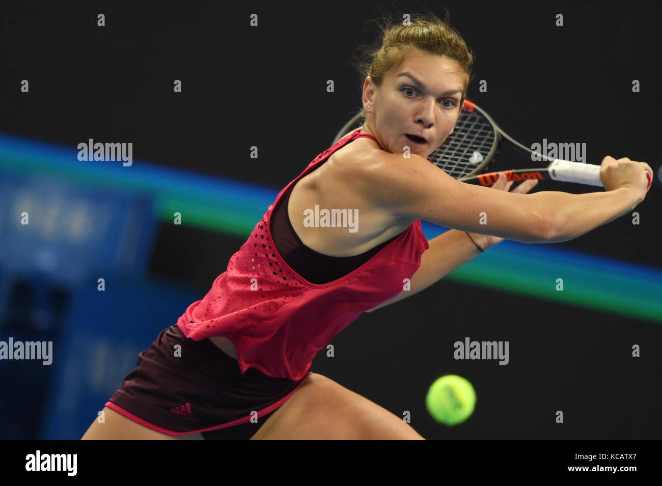Beijing, China. 4th October, 2017. Simona Halep of Romania returns the ...