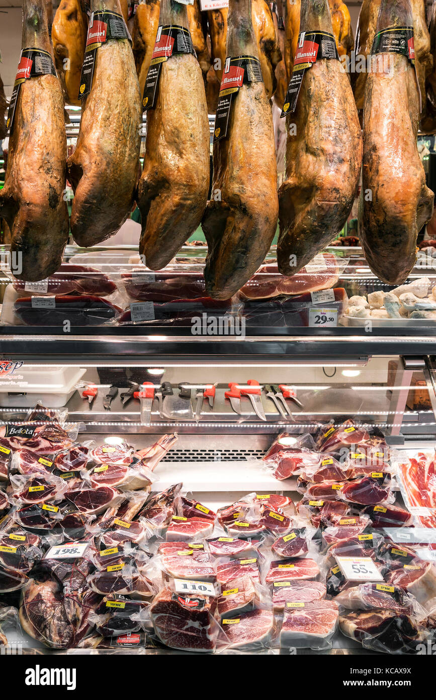 traditional spanish cured meats and sausages on display at la boqueria ...