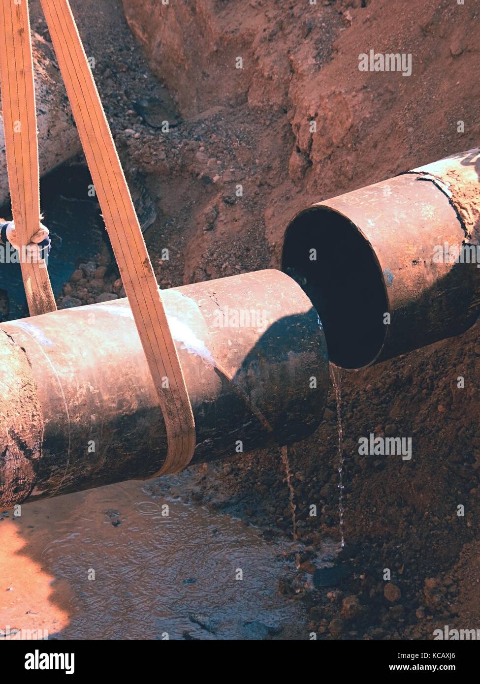 Rusty Old Iron Pipe With Clear Water Flowing From It. Waste water drain ...