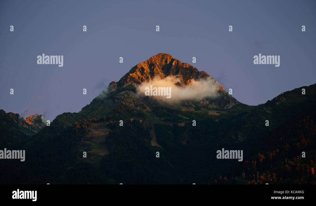 Beautiful sunset over mountain peak. North Caucasus Stock Photo - Alamy