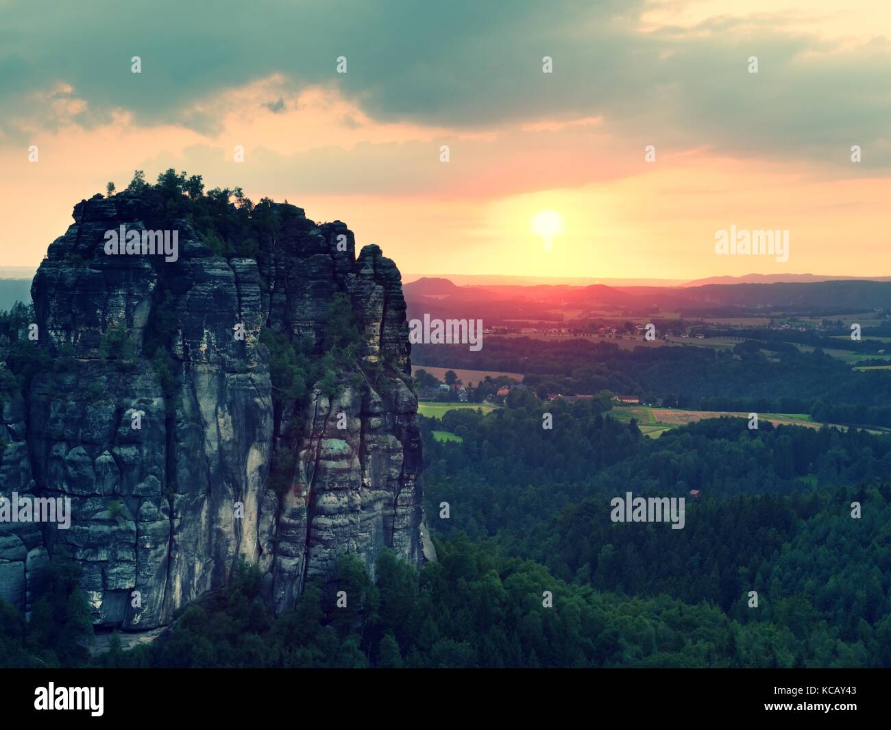 Sharp sandstone cliffs above deep valley. Popular climbers resort ...
