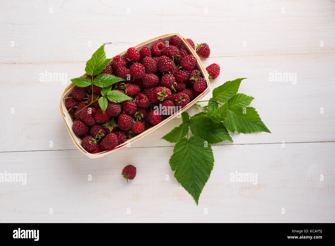 raspberries in box Stock Photo - Alamy