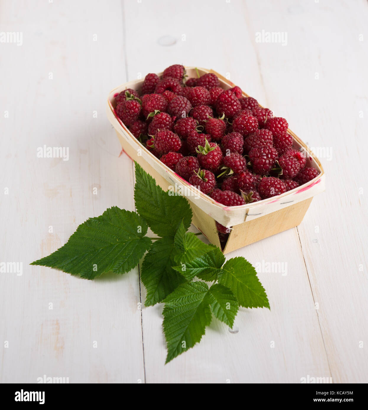 raspberries in box Stock Photo - Alamy