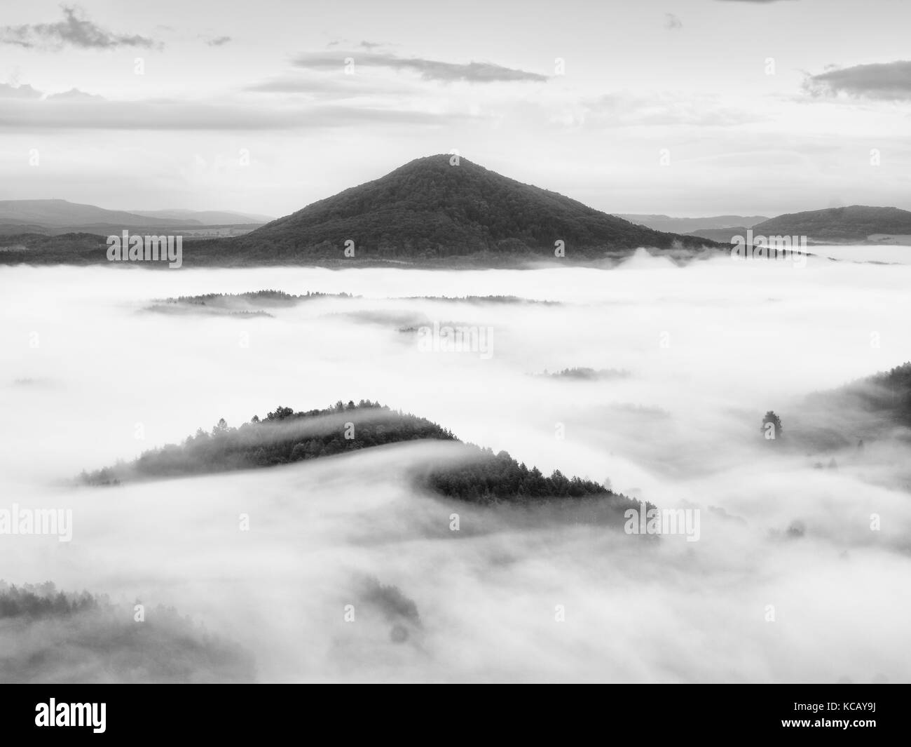 Heavy mist in landscape. Magnificent autumn creamy fog in countryside ...