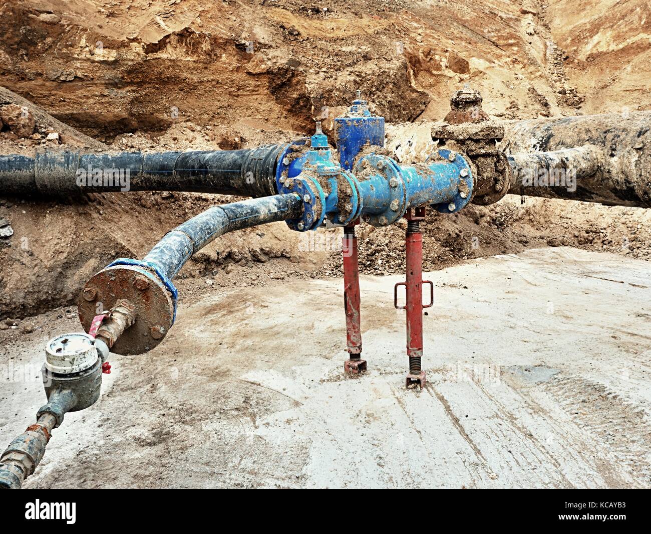 Old drink waser pipe, hydrometer and shut-off valve on plastic tube ...