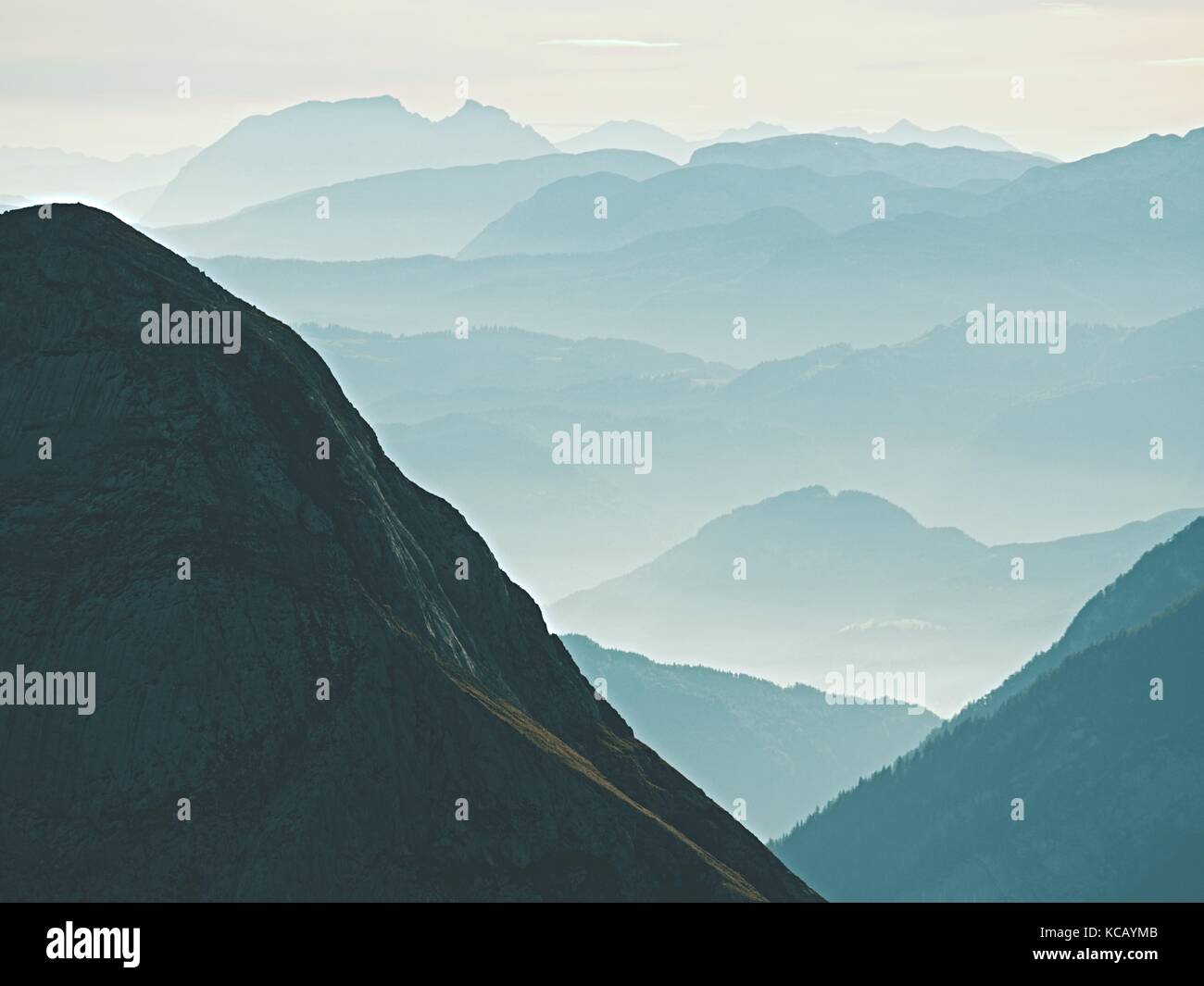 View over high sharp mountain peaks from plane, beautiful view ...