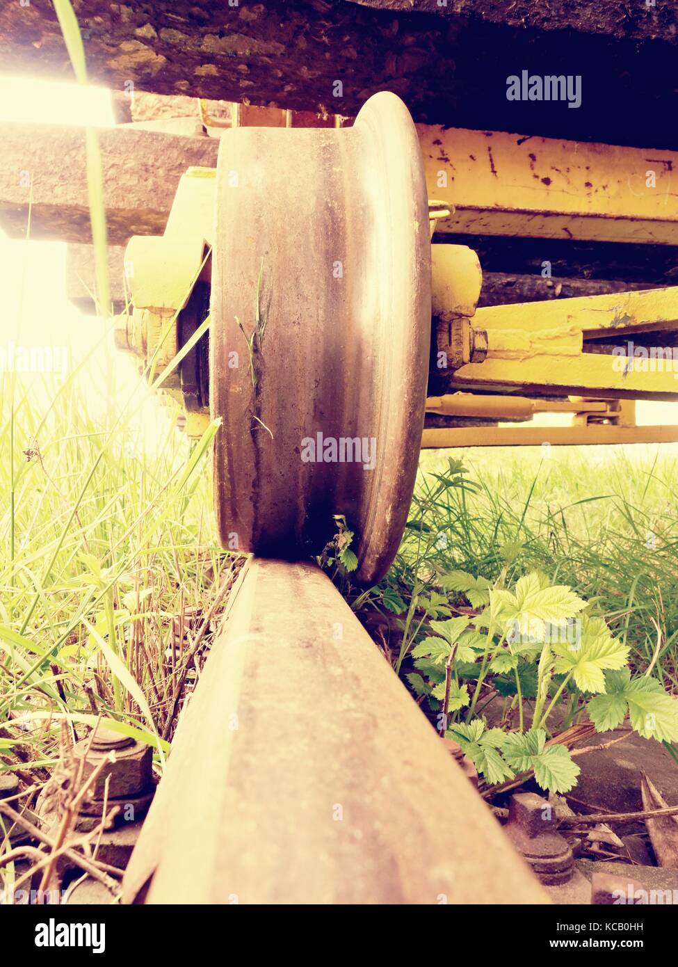 Wheel from a vintage cargo wagon. Old railway wagon of forgotten train ...