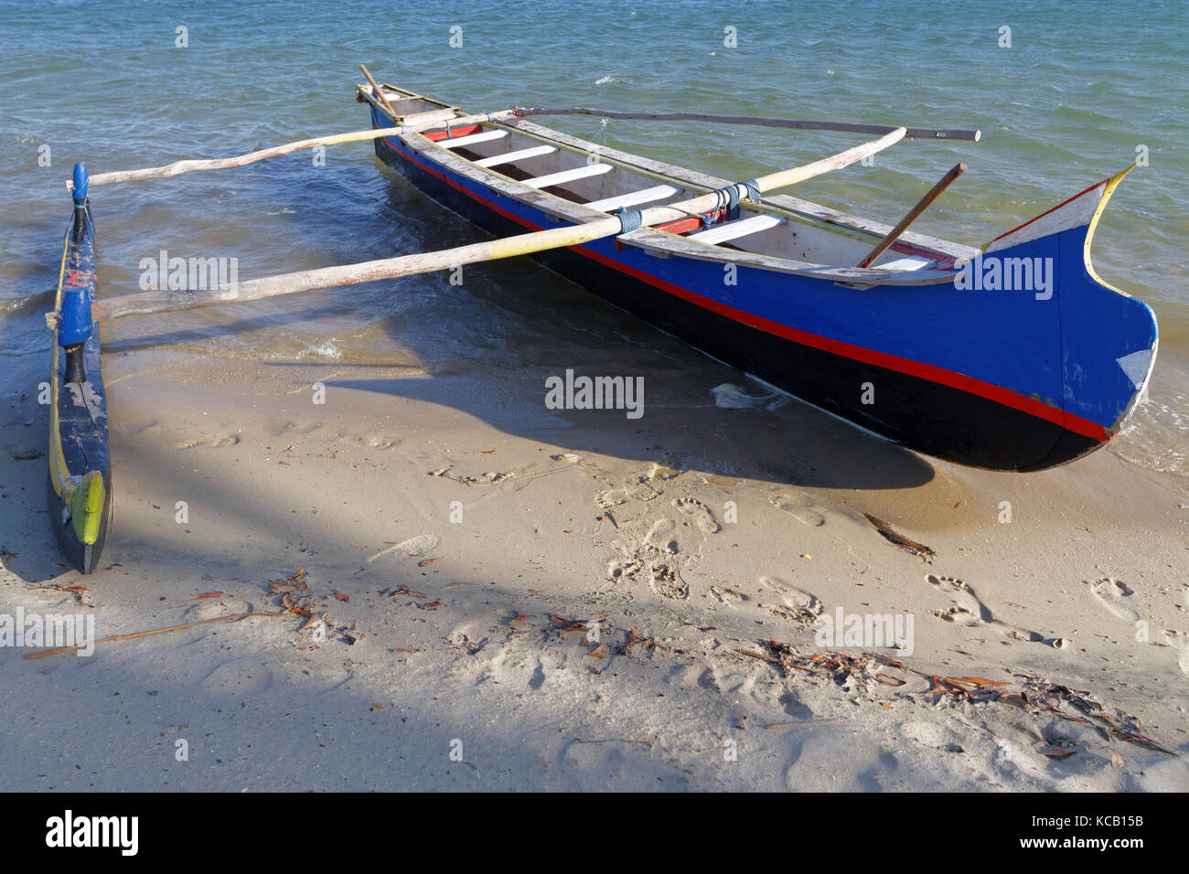 Traditional pirogue on a beach hi-res stock photography and images - Alamy
