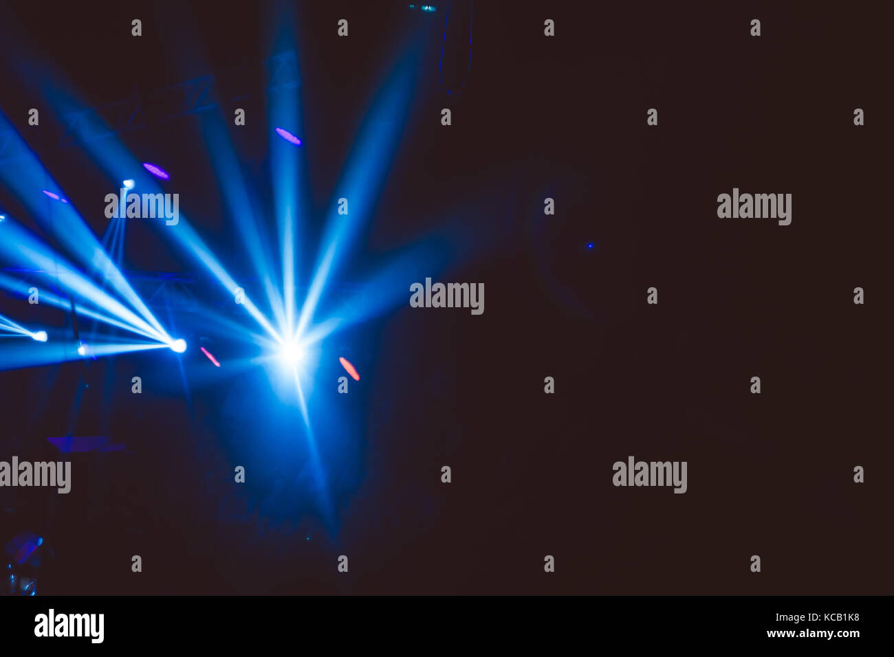 Stage lights on concert. Lighting equipment with multicolored beams ...