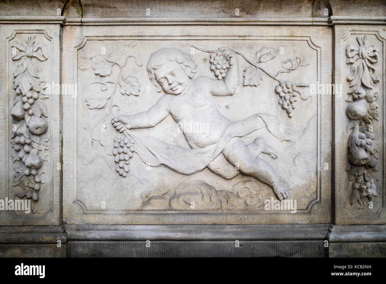Ornaments, mouldings, gargoyle, low reliefs in a sandstone, granite ...