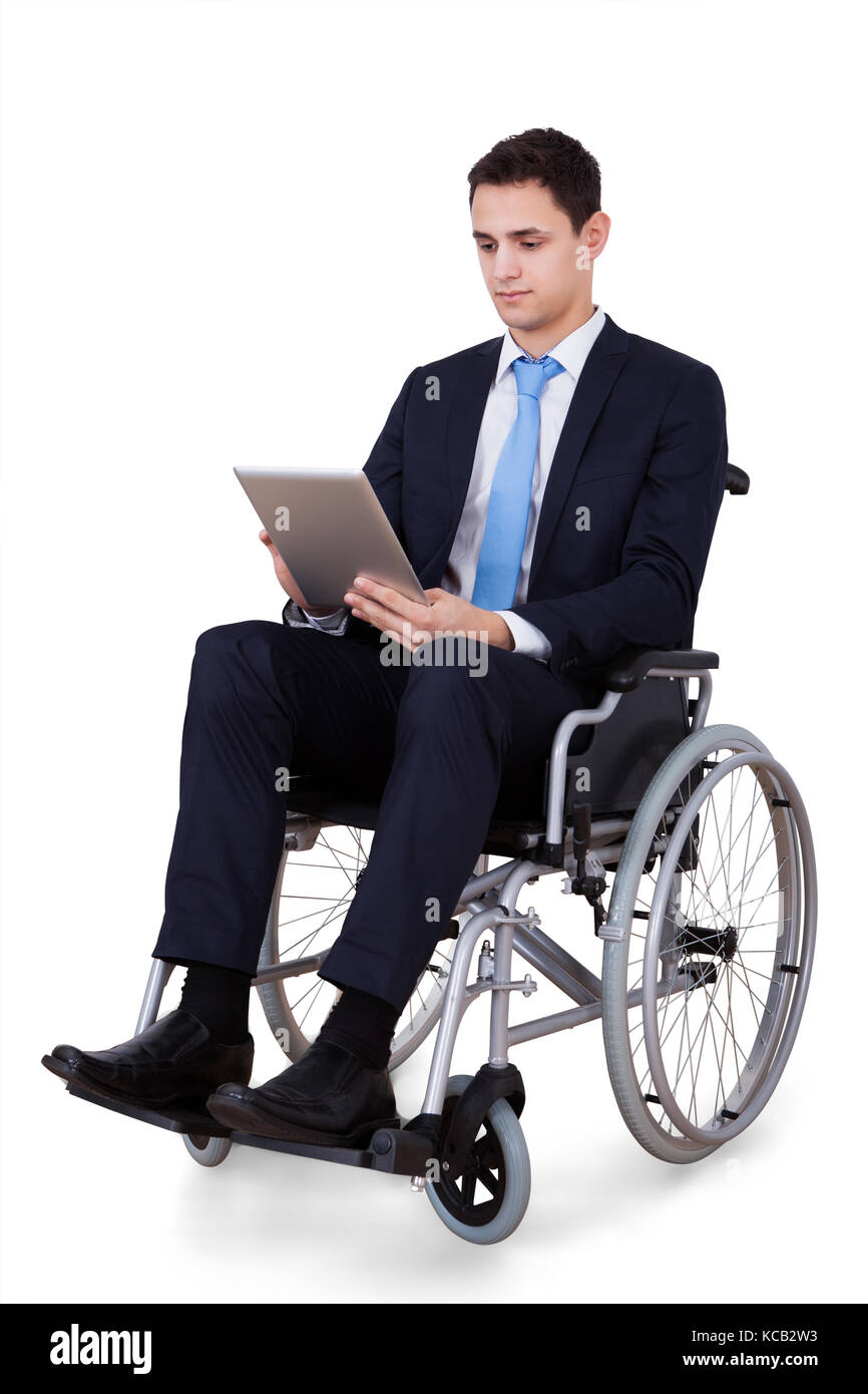 Handicapped Businessman Using Digital Tablet On White Background Stock ...