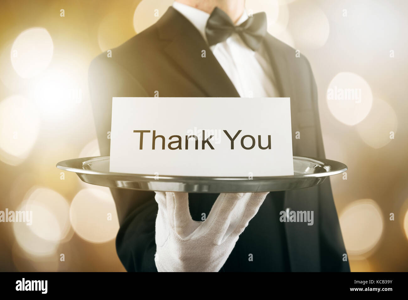 Close-up Of A Waiter Holding Thank You Card In Tray Stock Photo - Alamy