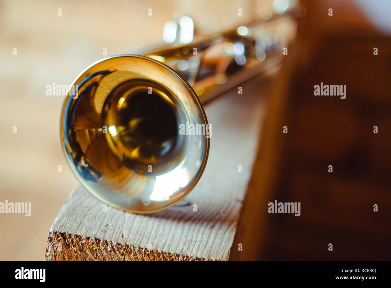 Trumpet on musical notes as background close up Stock Photo - Alamy