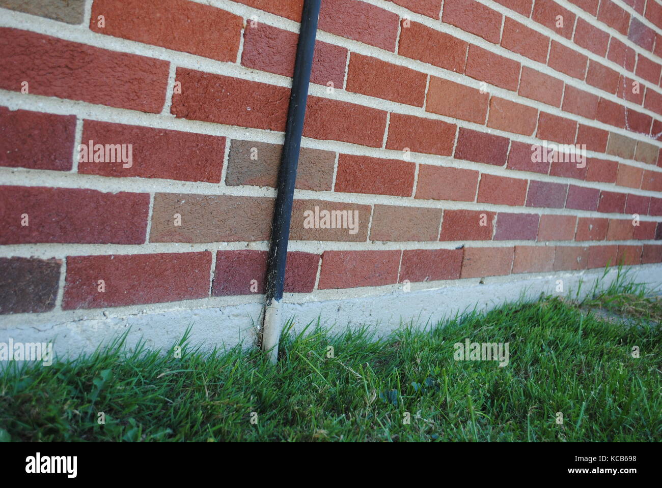 The side of a brick home Stock Photo - Alamy