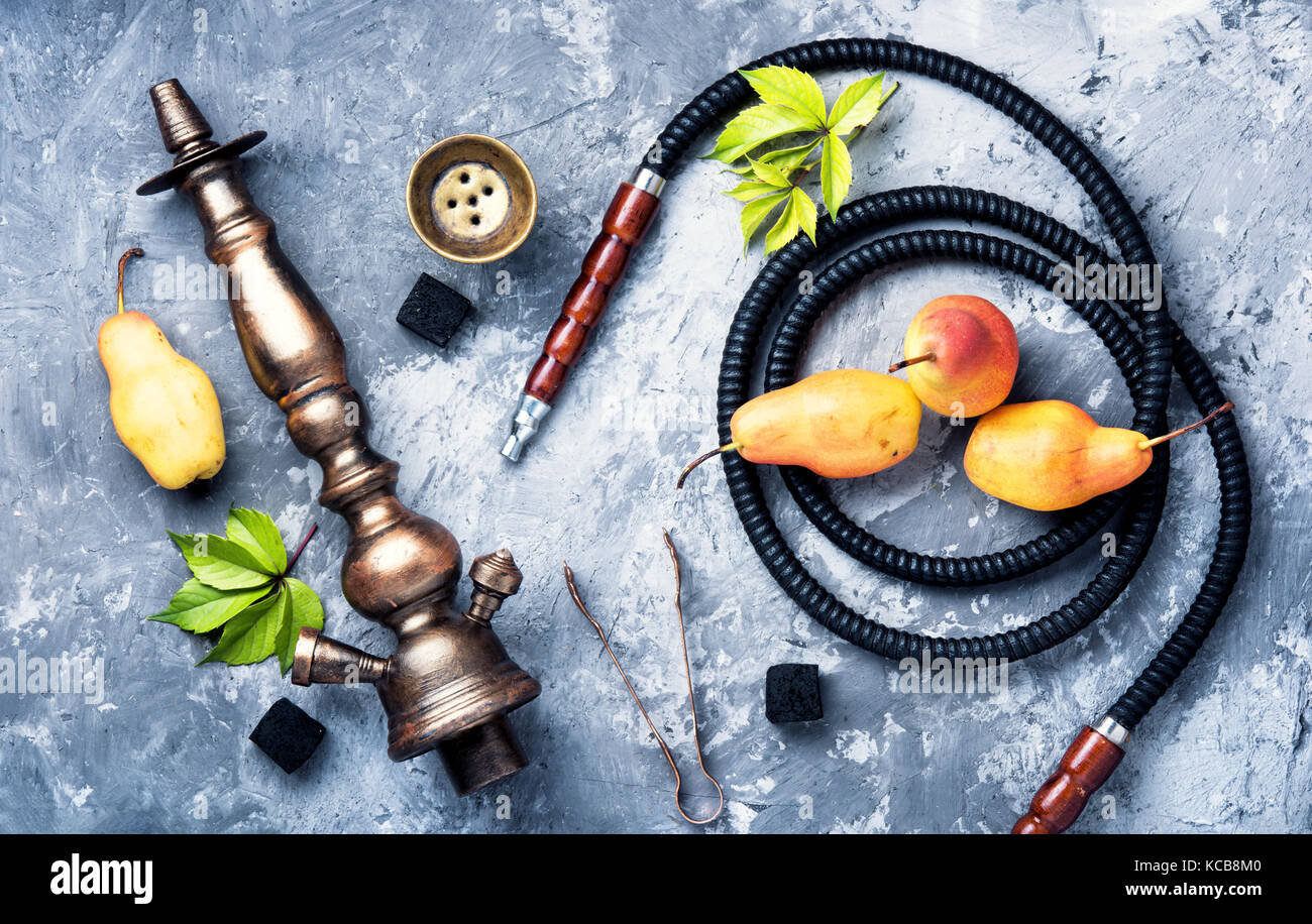 oriental shisha with tobacco aroma of pear Stock Photo - Alamy