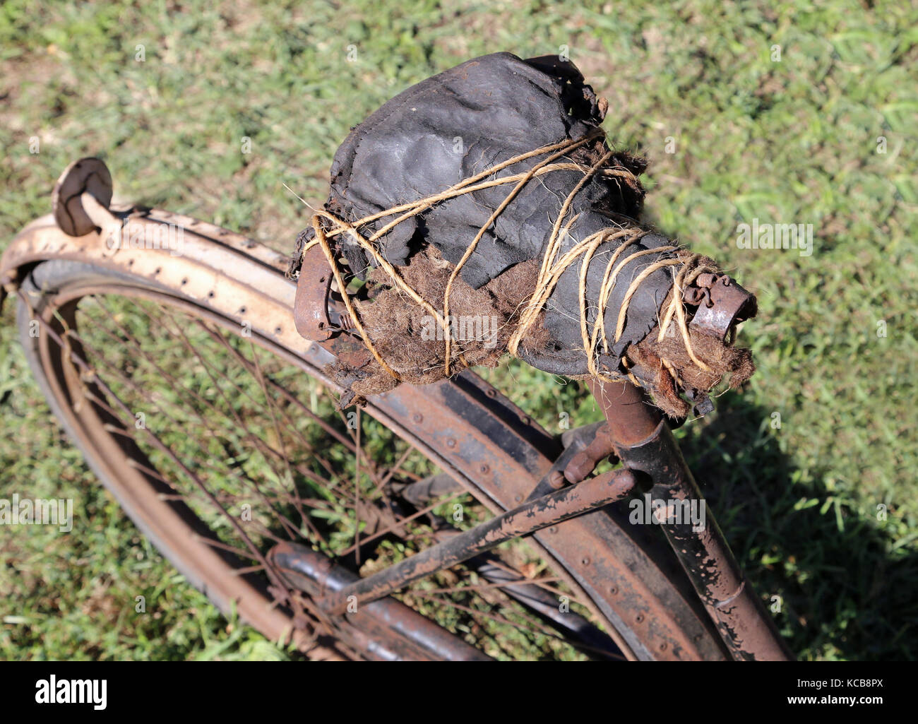 ancient broken saddle of a bike last century Stock Photo - Alamy