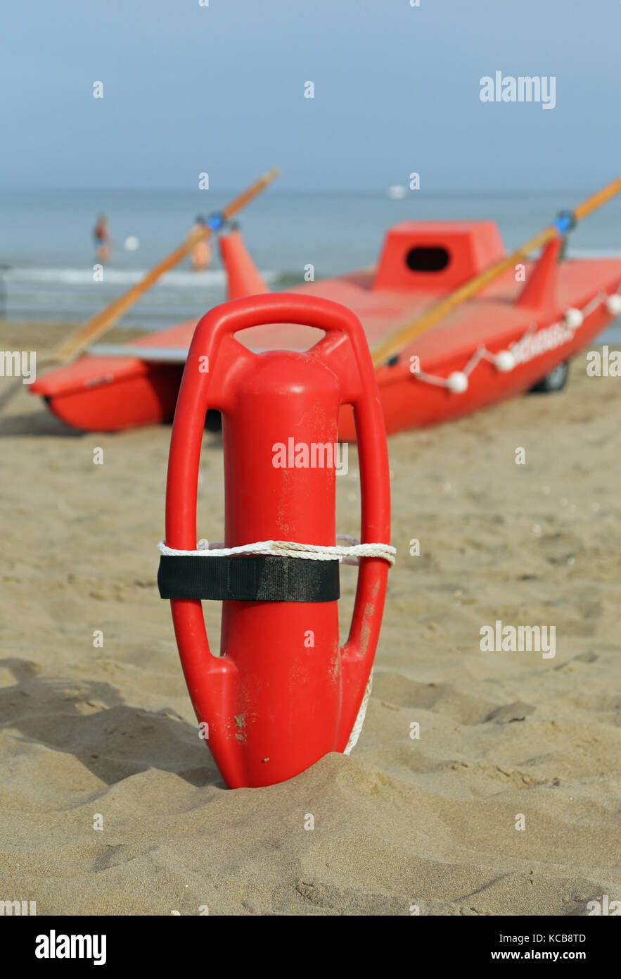 lifebuoy and lifeguard rescue boat on the seashore Stock Photo - Alamy