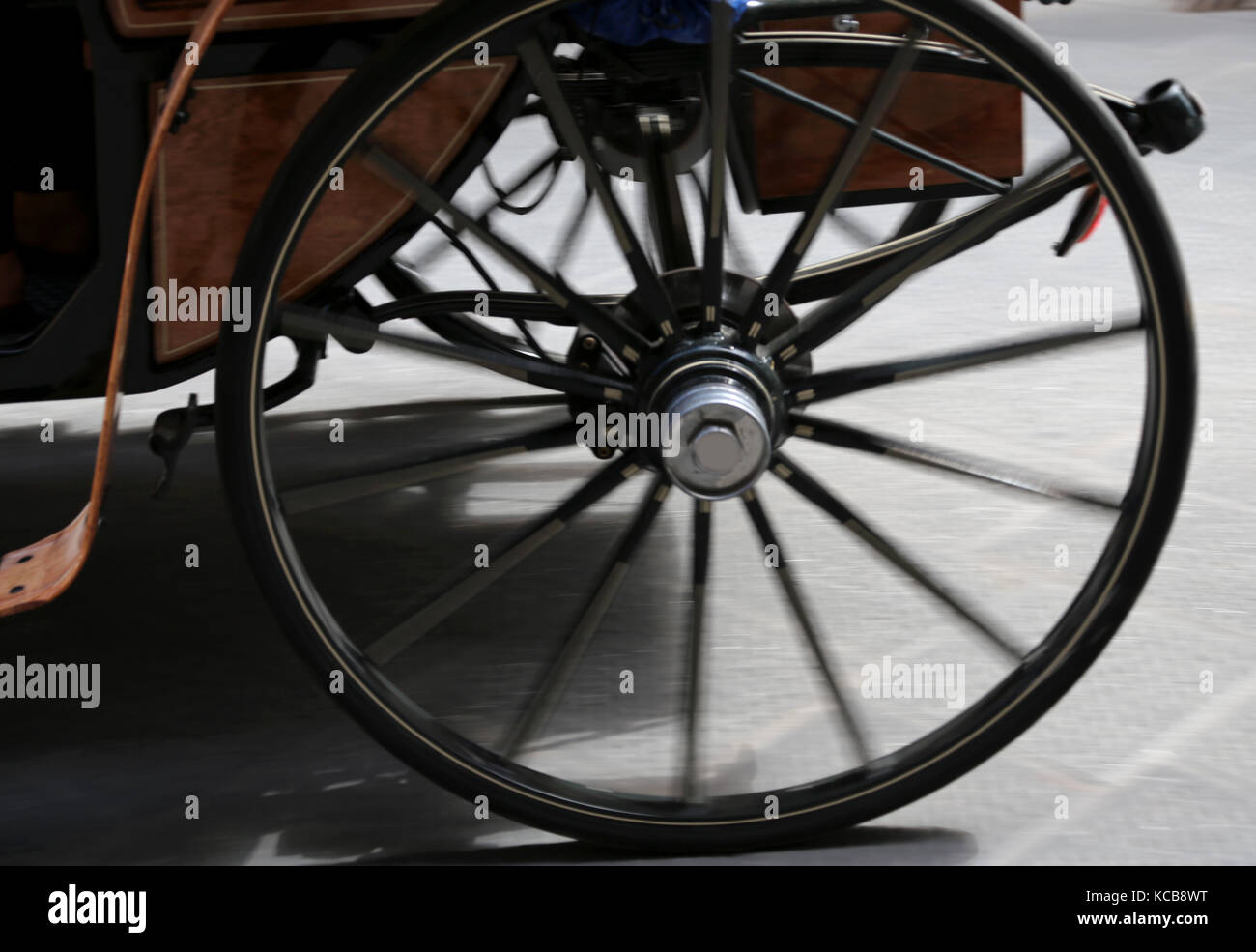Wooden wheel of an ancient Carriage in moviment Stock Photo - Alamy