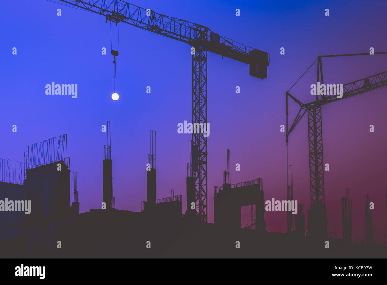 Construction site with two tower cranes Stock Photo - Alamy