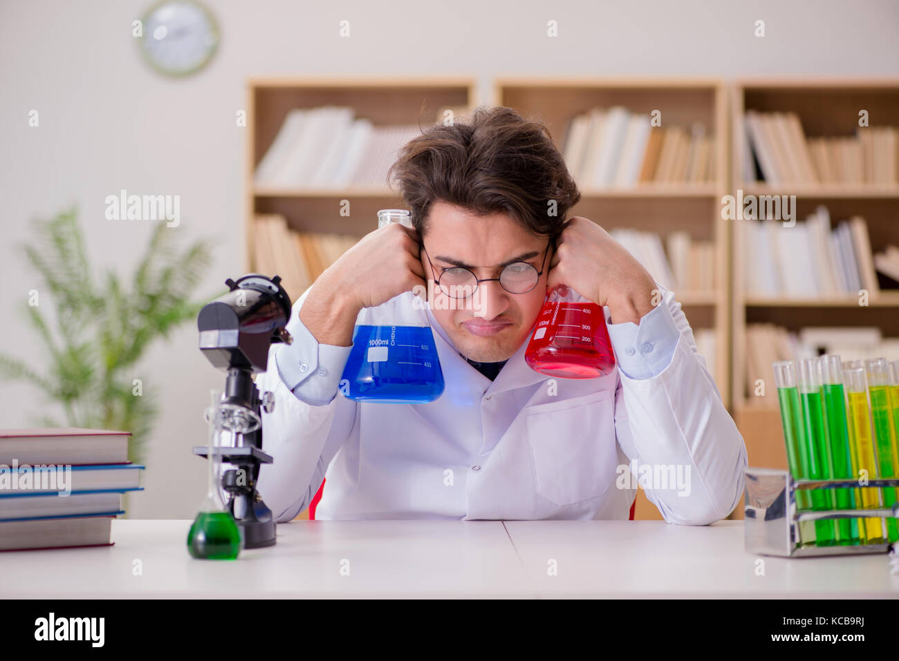 Mad crazy scientist doctor doing experiments in a laboratory Stock ...