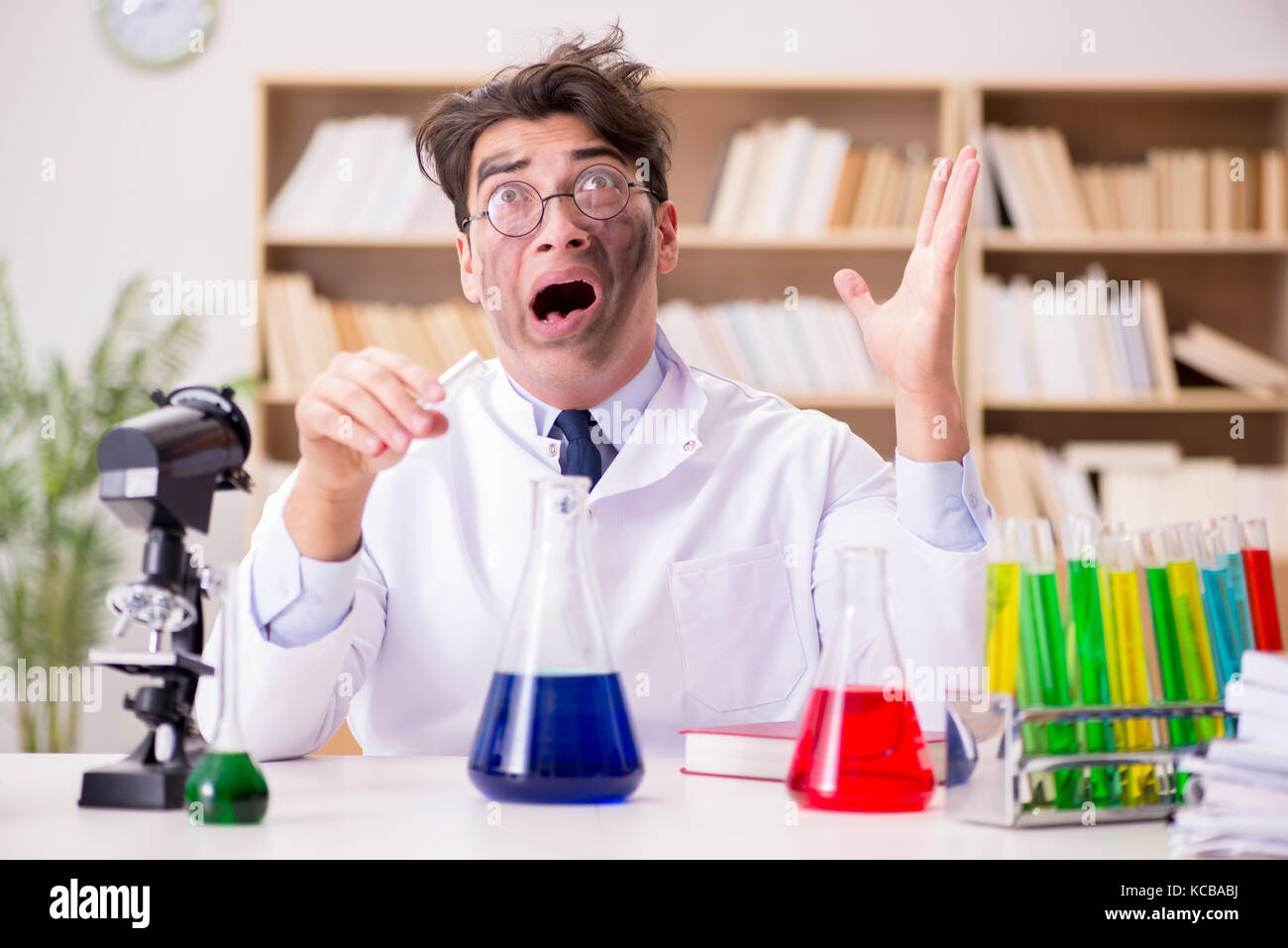 Mad crazy scientist doctor doing experiments in a laboratory Stock ...