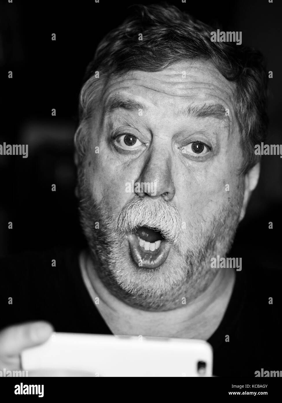 Middle aged man talk Black and White Stock Photos & Images - Alamy