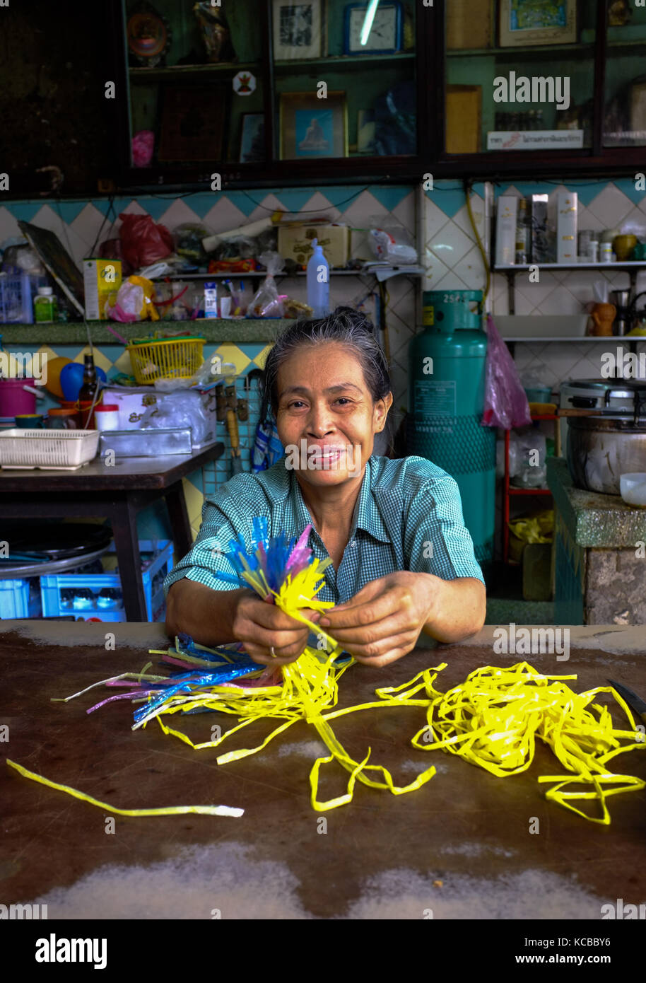 Female shop worker, Chinatown, Bangkok, Thailand Stock Photo - Alamy