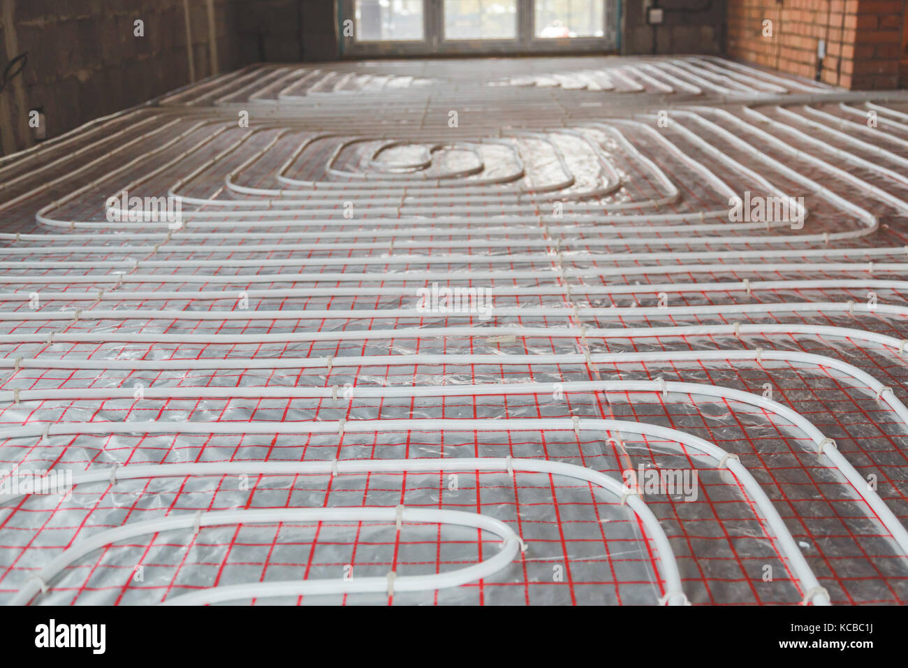 Heating posed in a under construction building Stock Photo - Alamy