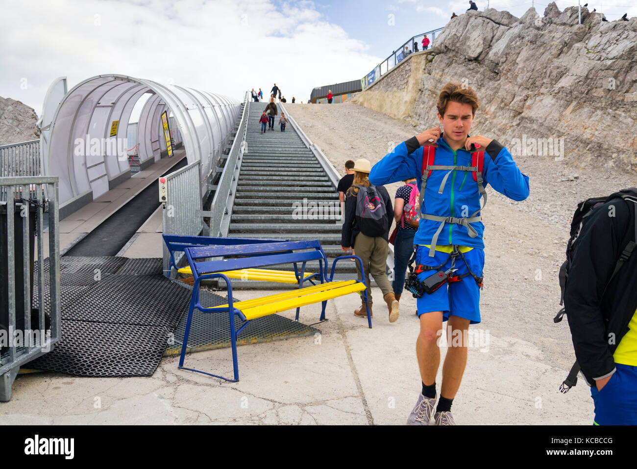 RAMSAU AM DACHSTEIN, AUSTRIA - AUGUST 17: Ski lift with people walking ...