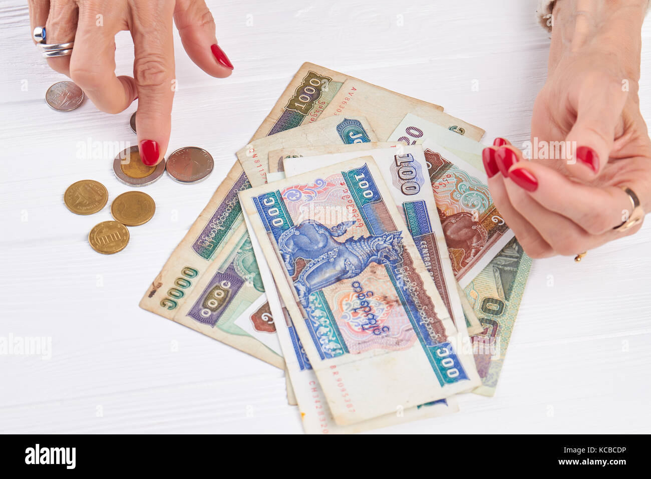 Paper money and coins of Myanmar Stock Photo - Alamy