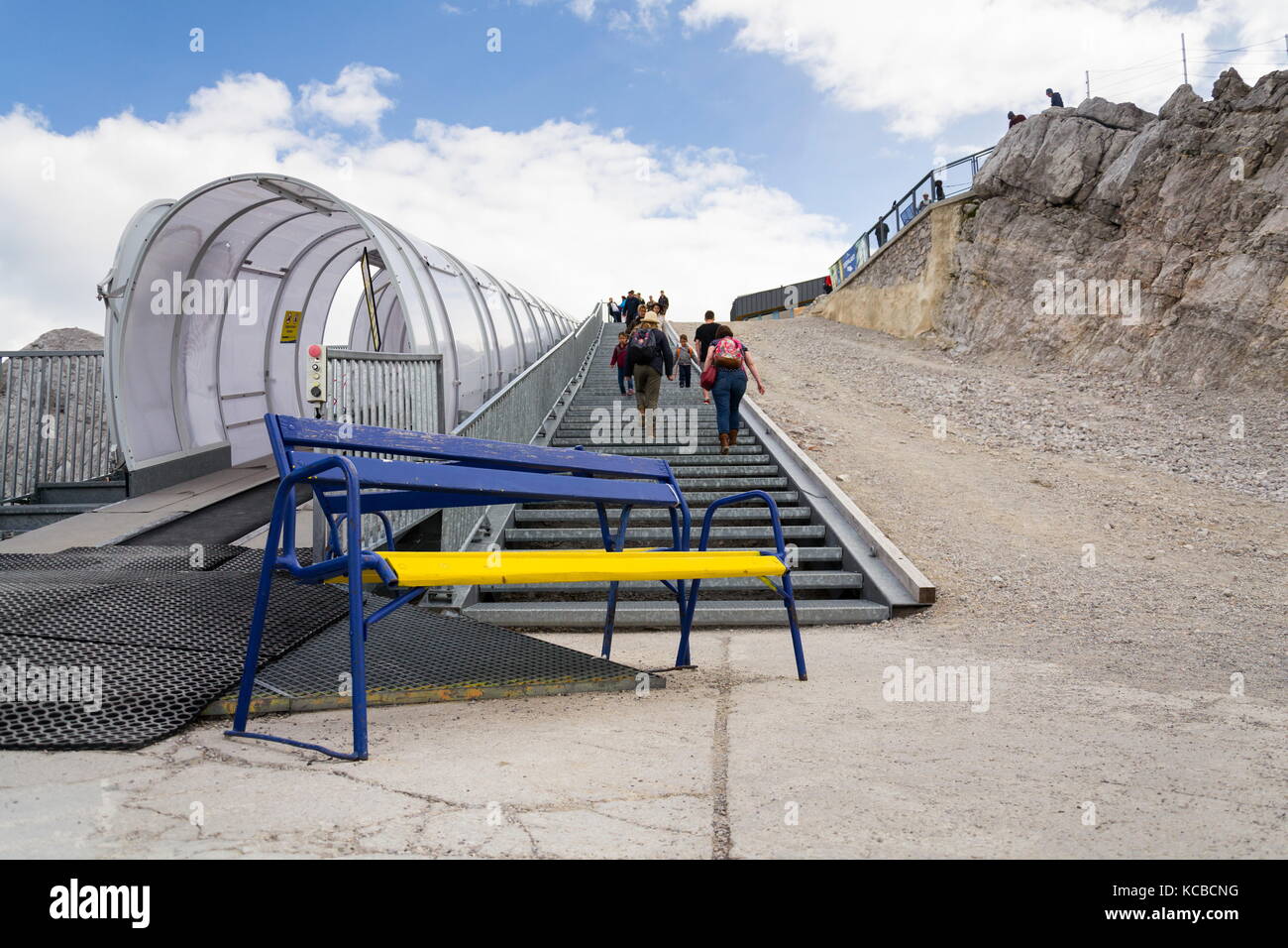 RAMSAU AM DACHSTEIN, AUSTRIA - AUGUST 17: Ski lift with people walking ...