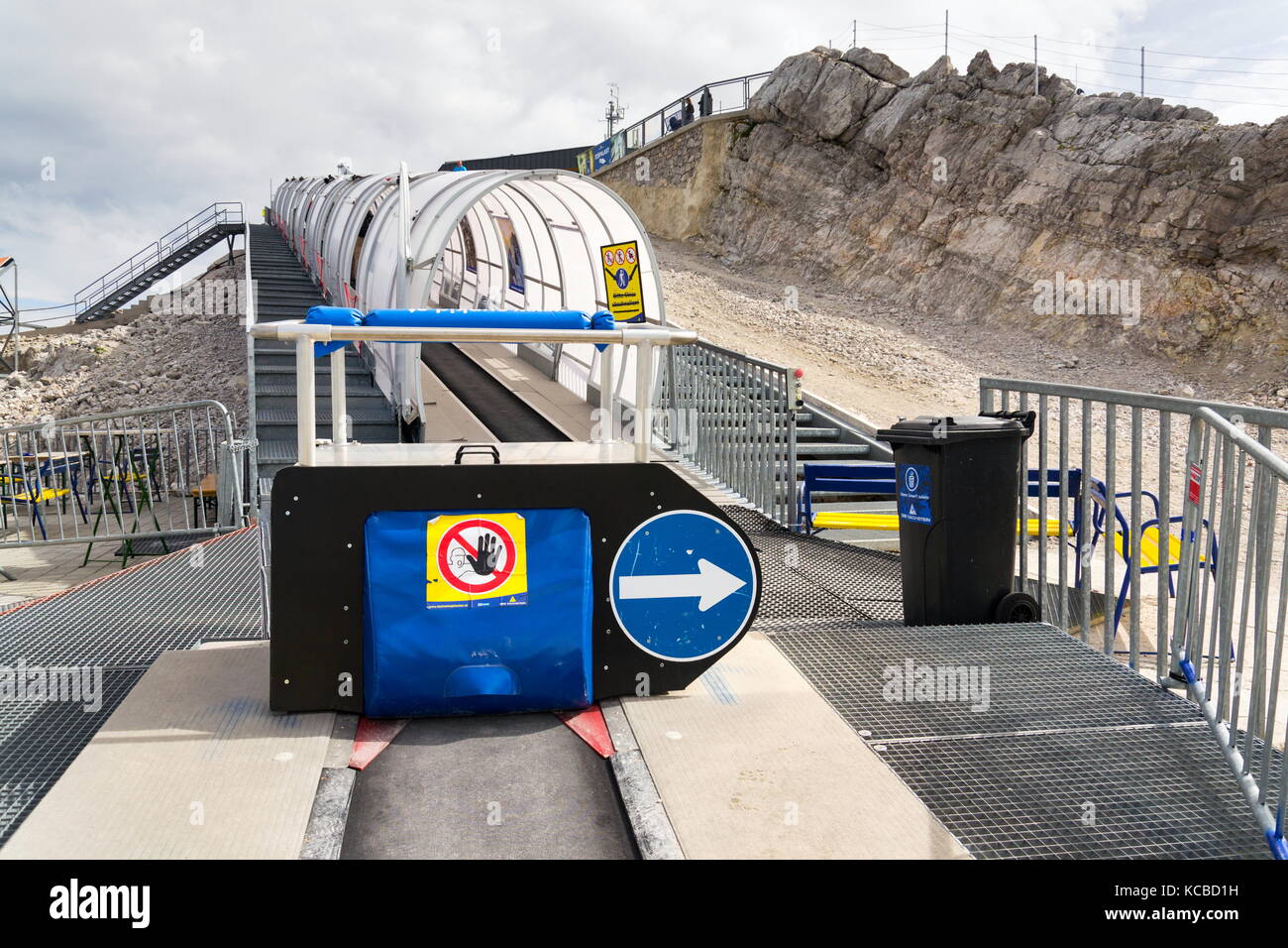 RAMSAU AM DACHSTEIN, AUSTRIA - AUGUST 17: Ski lift with people walking ...