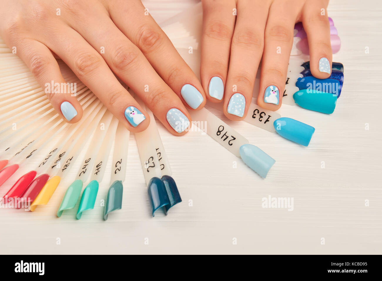 Manicured hands and nail color samples Stock Photo - Alamy
