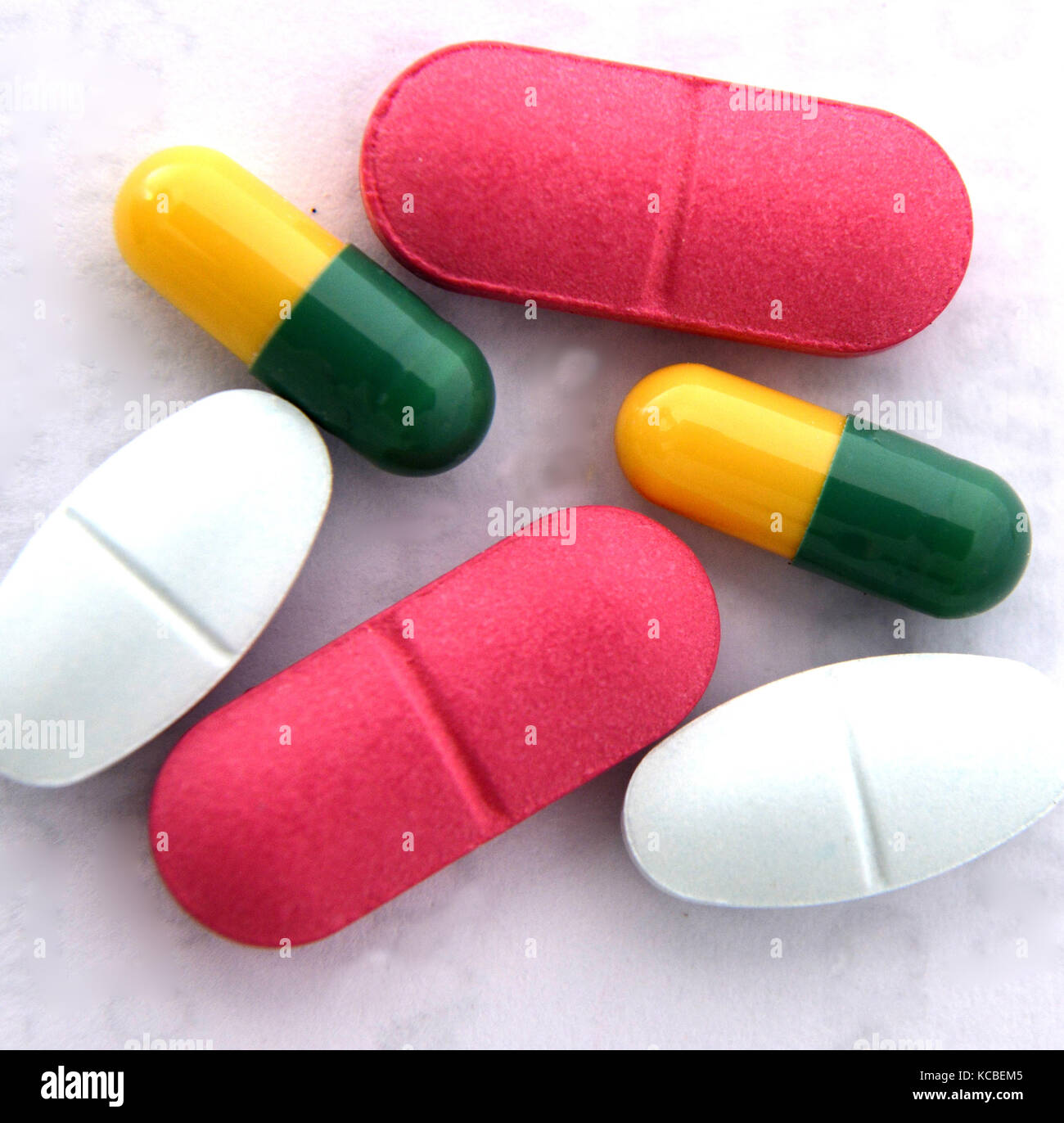 Many colorful pills and capsules ,close up image Stock Photo - Alamy