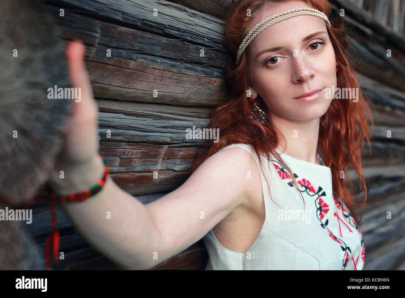 Girl in the spring walks through the apple alley Stock Photo - Alamy