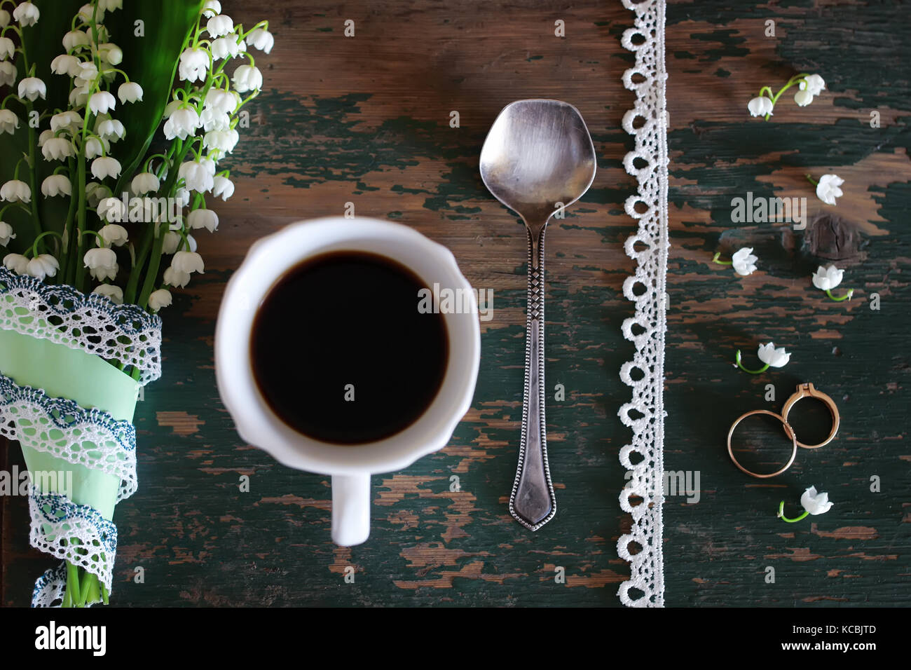 bouquet of lilies of the valley and morning coffee Stock Photo - Alamy