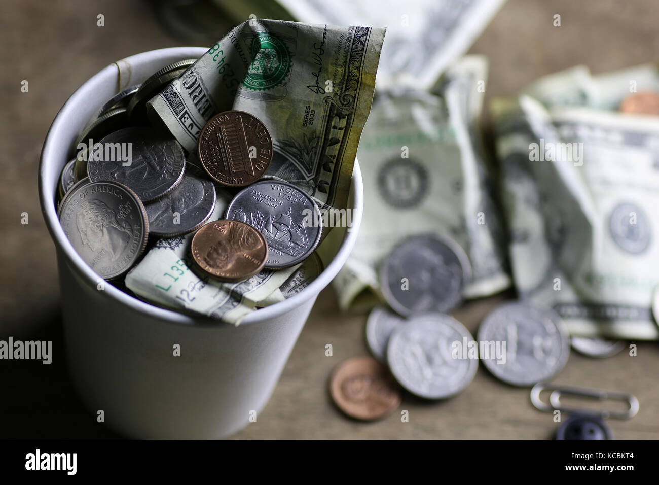 begging coin money Stock Photo - Alamy