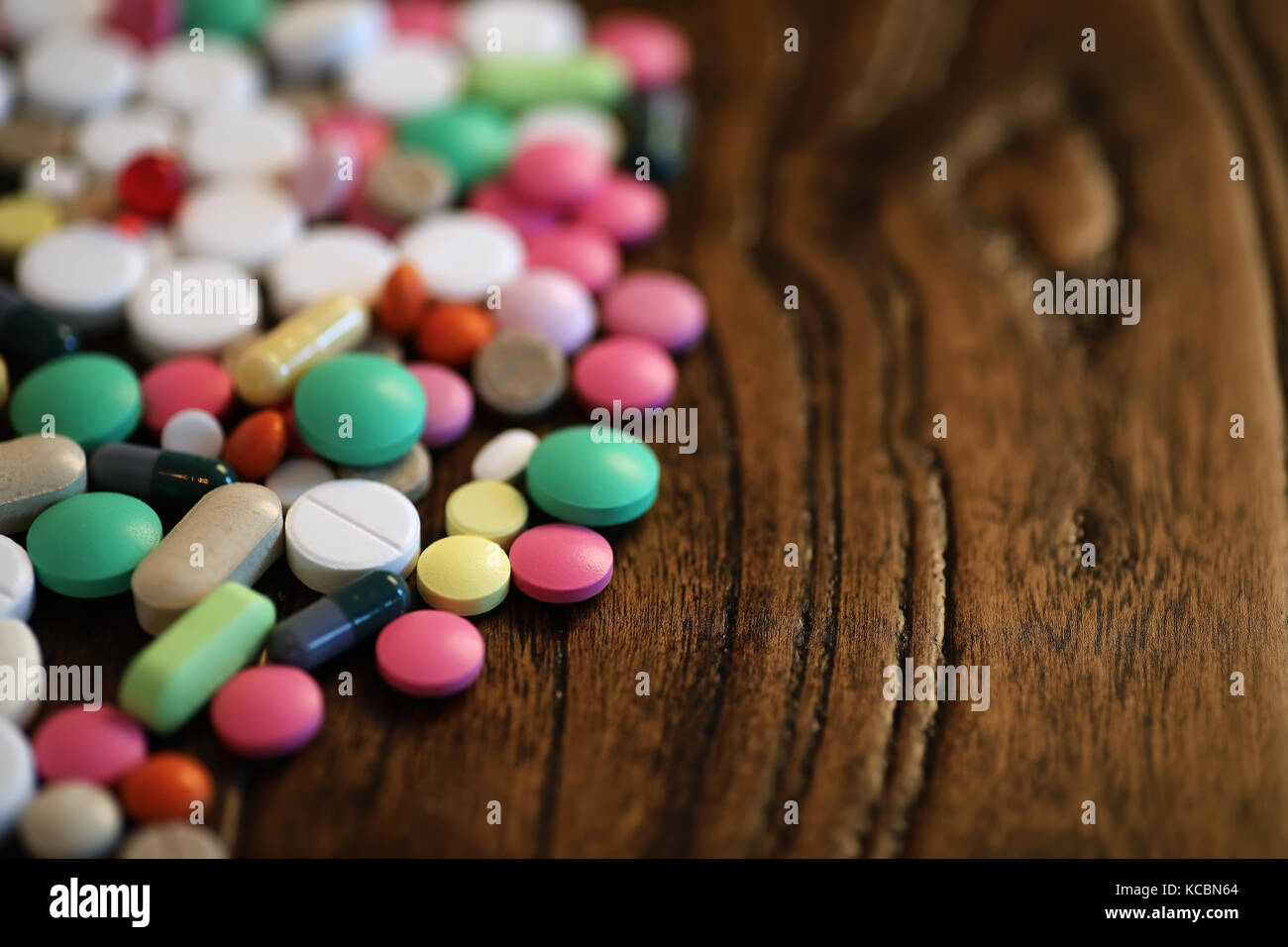 Multicolored tablets of different shapes and sizes Stock Photo - Alamy