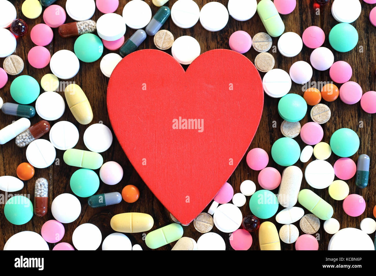 Multicolored tablets of different shapes and sizes Stock Photo - Alamy