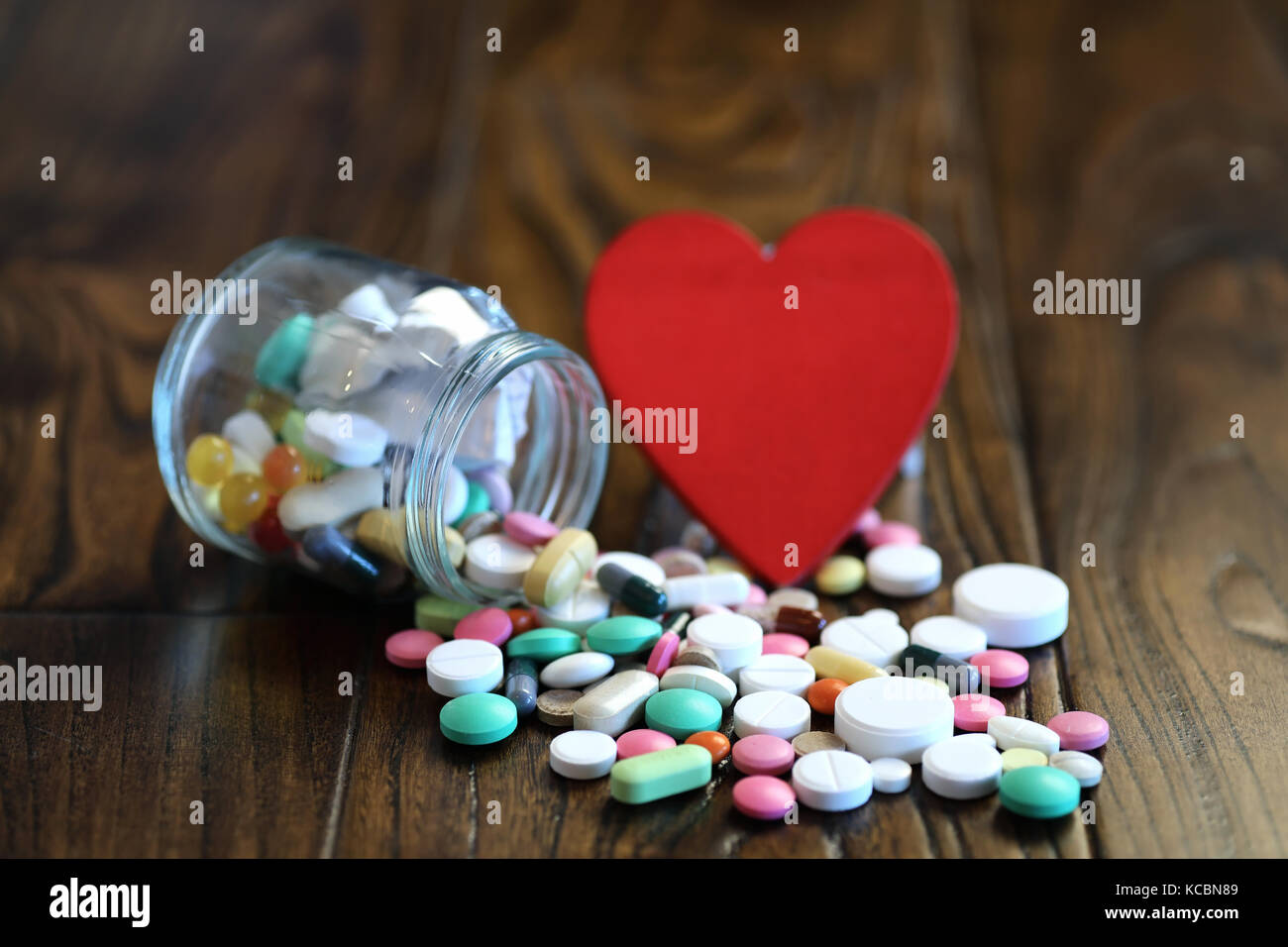 Multicolored tablets of different shapes and sizes Stock Photo - Alamy