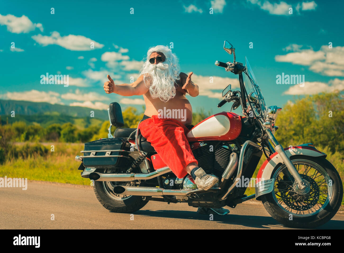Fat man riding motorcycle hi-res stock photography and images - Alamy