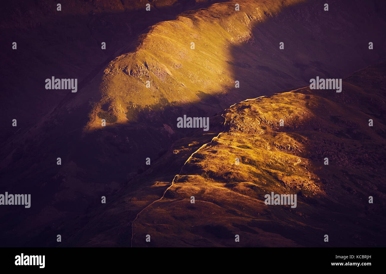 Sunsetting over mountain ridges in the English Lake District, UK Stock ...