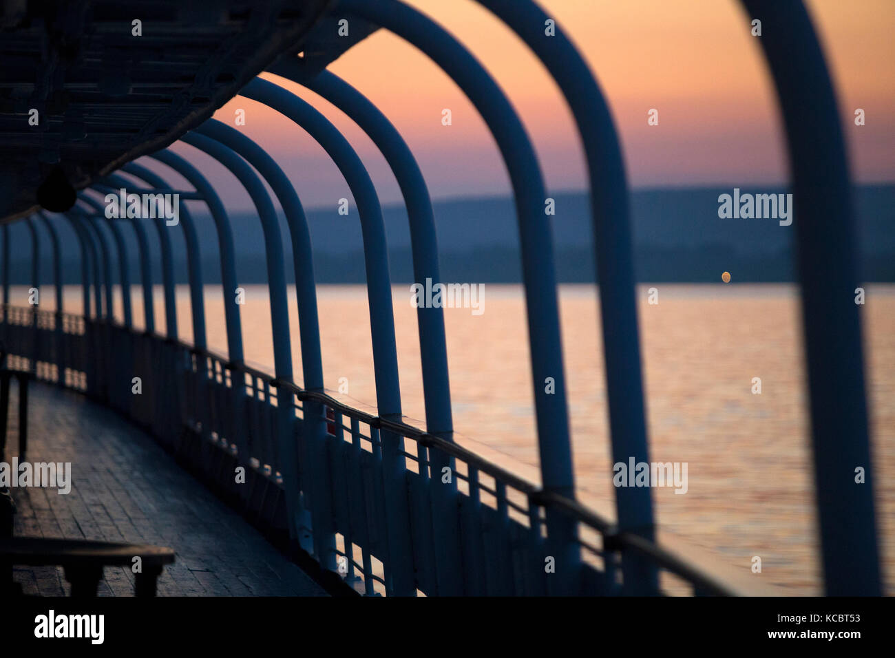Cruise ship deck at sunset Stock Photo - Alamy