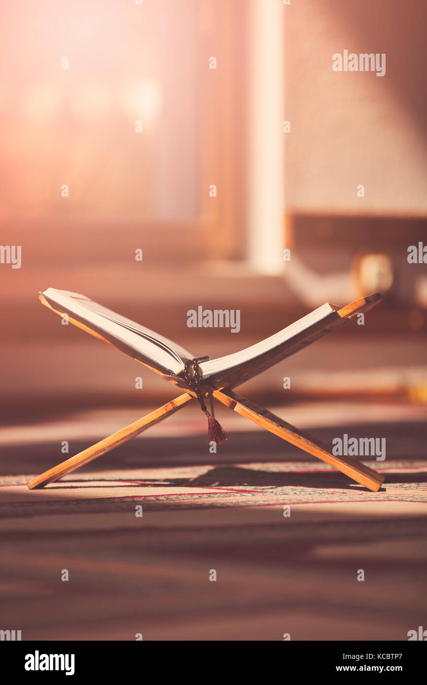 Quran in the mosque - open for prayers Stock Photo - Alamy