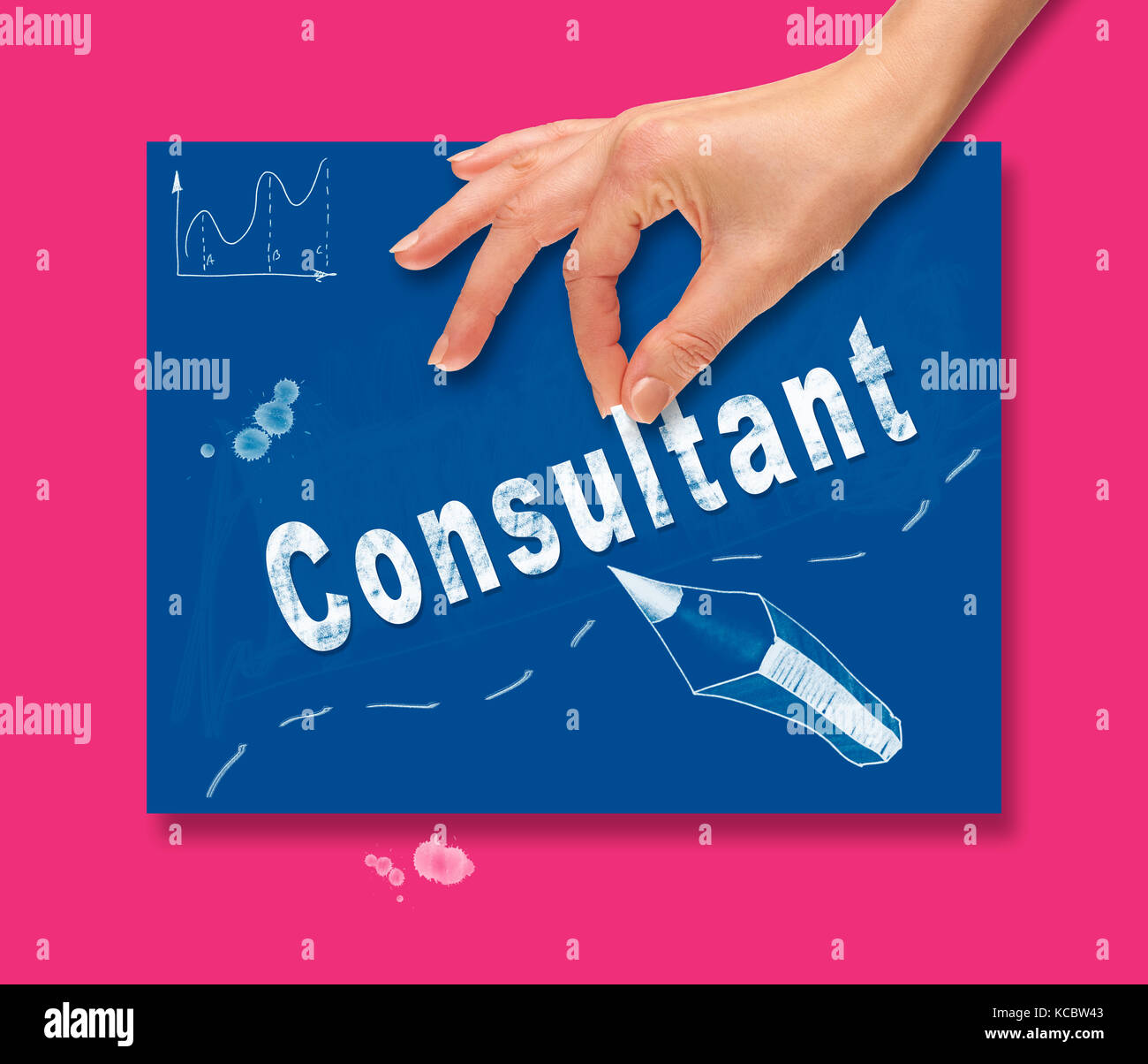 A hand picking up a Consultant concept on a colorful drawing board ...