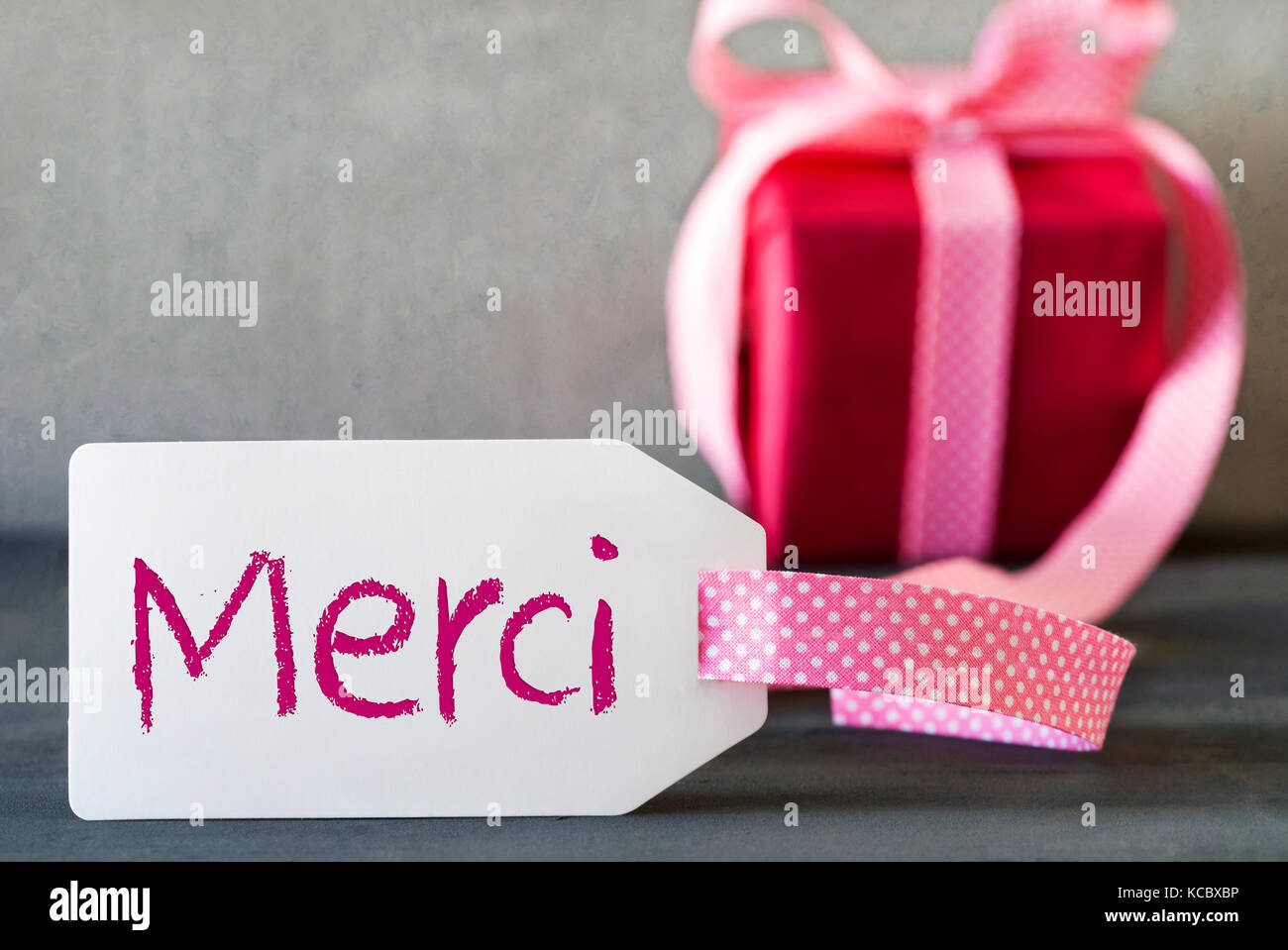 Pink Gift, Label, Merci Means Thank You Stock Photo - Alamy
